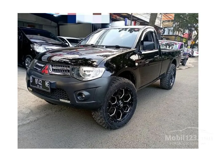 Jual Mobil Mitsubishi Strada Triton 2013 GLX 2.5 di Jawa Barat Manual Pick-up Hitam Rp 155.000. ...