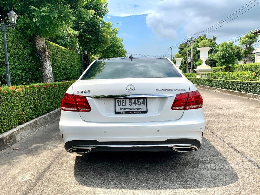 Mercedes-Benz E300 2014 W212 (ปี 10-16) AMG Dynamic Blue TEC HYBRID 2.1 เกียร์อัตโนมัติ สีขาว ...